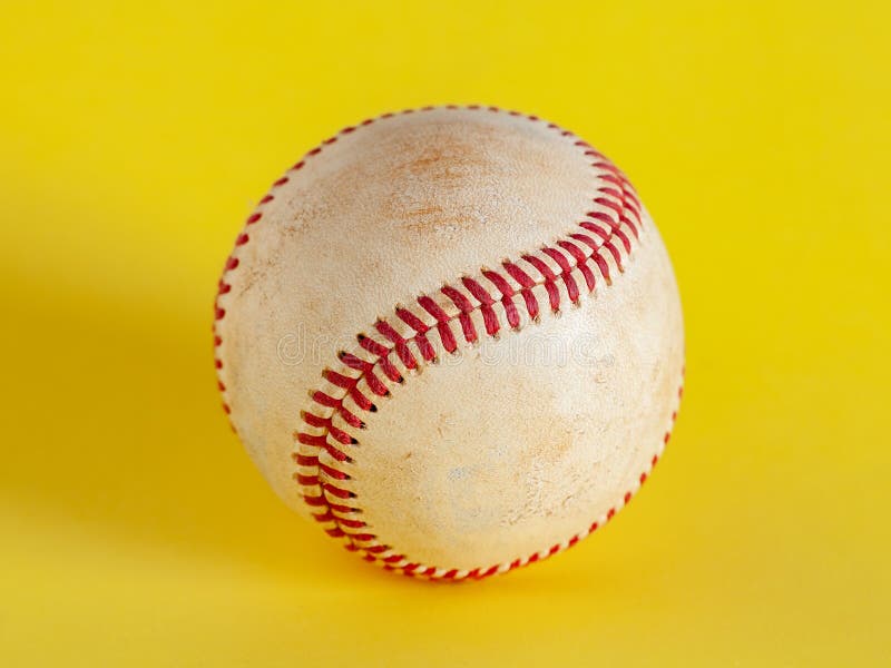 Worn Baseball Isolated on Yellow Background, Team Sport Stock Image ...