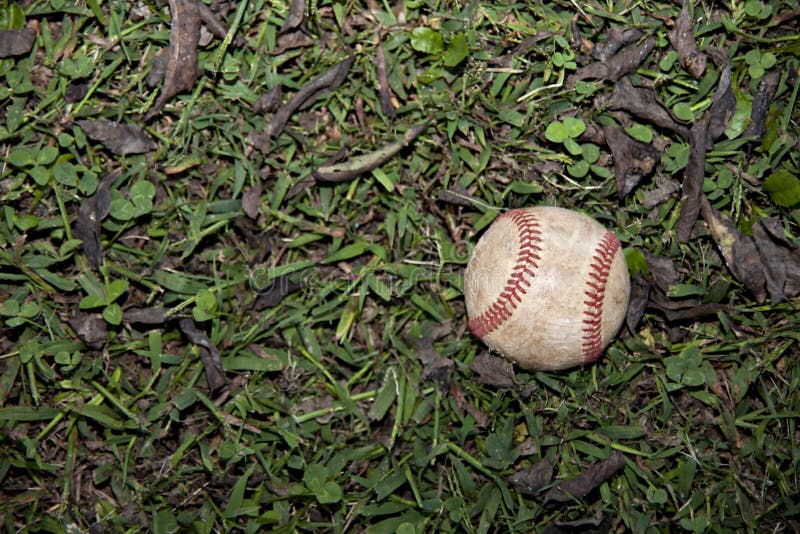 Worn Baseball Waiting for Play. Stock Photo - Image of thread, outside ...