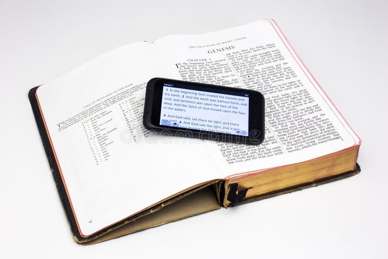 Worn Bible and Smartphone - Genesis Stock Photo - Image of gold ...