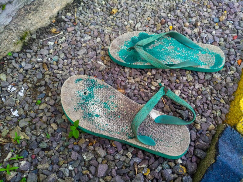 Worn and Broken Old Rubber Flip-flops on Gravel Stock Photo - Image of ...