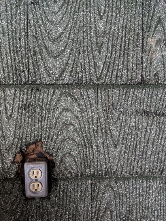 Worn Electric Outlet in Weathered Environment with Textured Surface ...