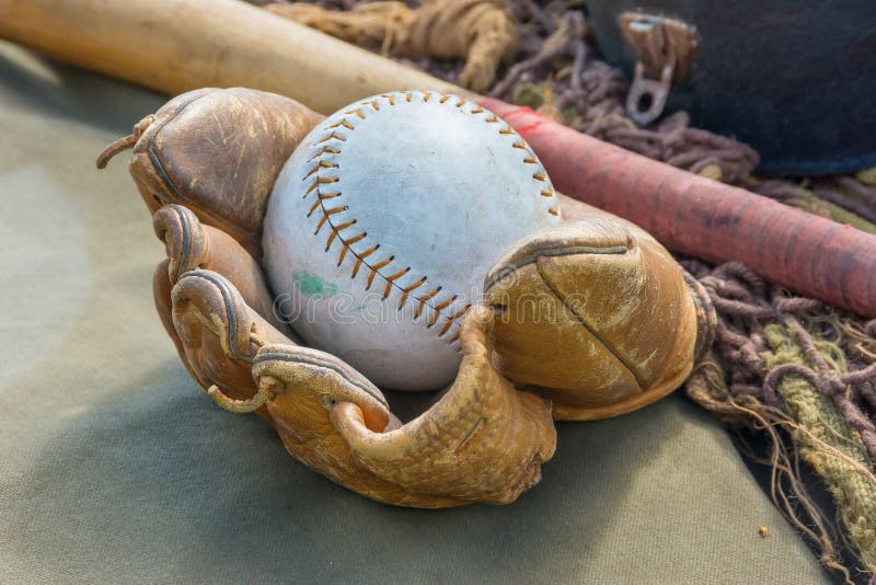 Worn Leather Basball Mitt with Bat. Stock Image - Image of weathered ...