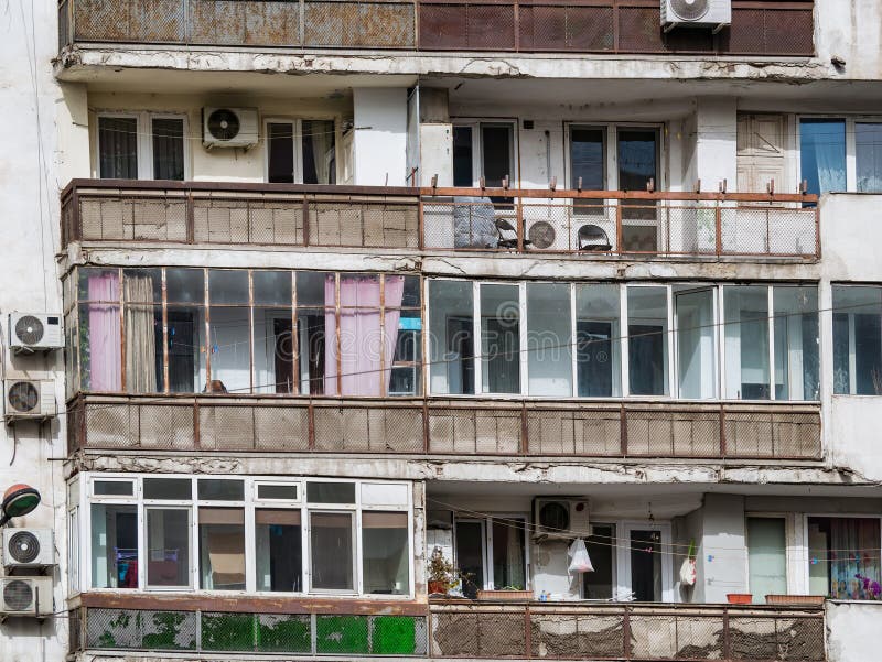 Worn Out Apartment Building from the Communist Era Against Blue Sky in ... Worn Out Apartment Building from the Communist Era Against Blue Sky in ...