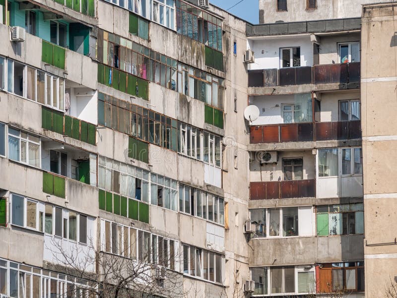 Worn Out Apartment Building from the Communist Era Against Blue Sky in ... Worn Out Apartment Building from the Communist Era Against Blue Sky in ...