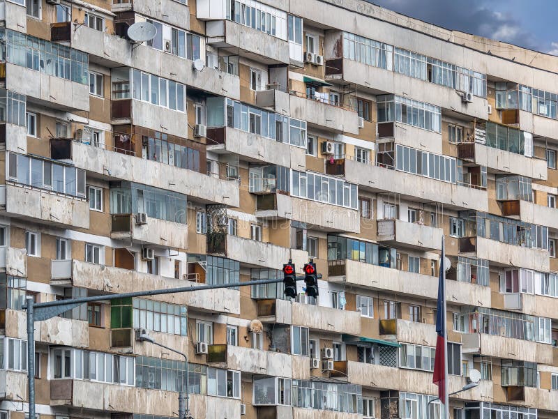 Worn Out Apartment Building from the Communist Era Against Blue Sky in ... Worn Out Apartment Building from the Communist Era Against Blue Sky in ...