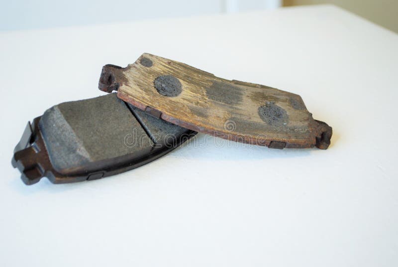 Worn Out Ruined Disc Brake Pad Compared To One that is New Stock Image ...