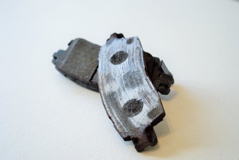 Worn Out Ruined Disc Brake Pad Compared To One that is New Stock Photo ...