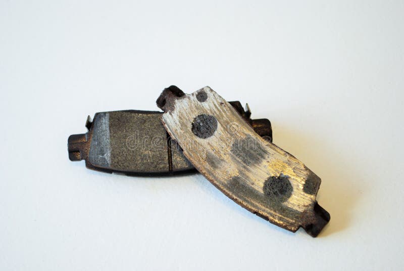 Worn Out Ruined Disc Brake Pad Compared To One that is New Stock Image ...