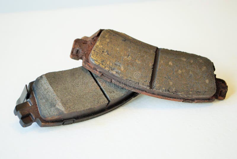 Worn Out Ruined Disc Brake Pad Compared To One that is New Stock Image ...