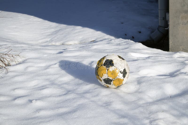 Worn-out Soccer Ball on Snow Stock Photo - Image of game, snow: 244055446