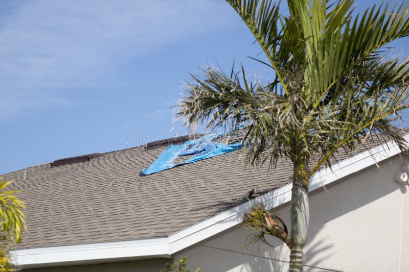 Worn Out Tarp Months after a Hurricane Stock Image - Image of roofers ...