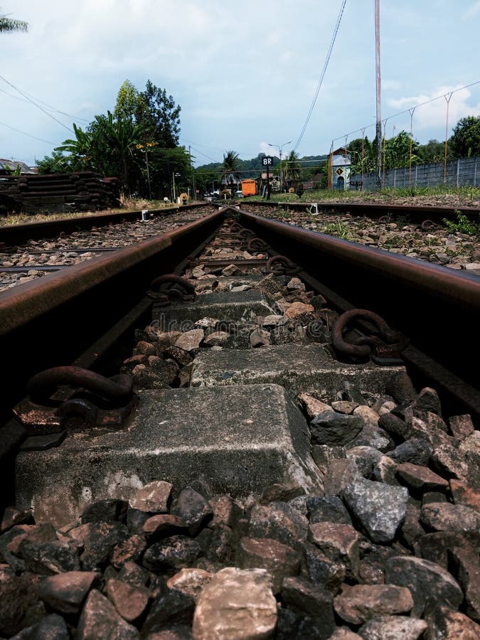 Worn Rail Track Around the Rocks Stock Image - Image of rail, track ...