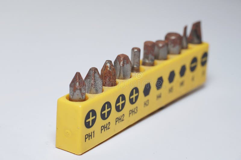 Worn and Rusty Screwdriver Bits in Yellow Box Stock Image - Image of ...