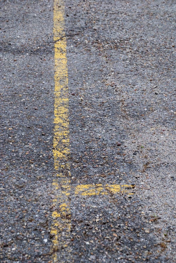 Worn yellow line painted stock photo. Image of material - 147712004