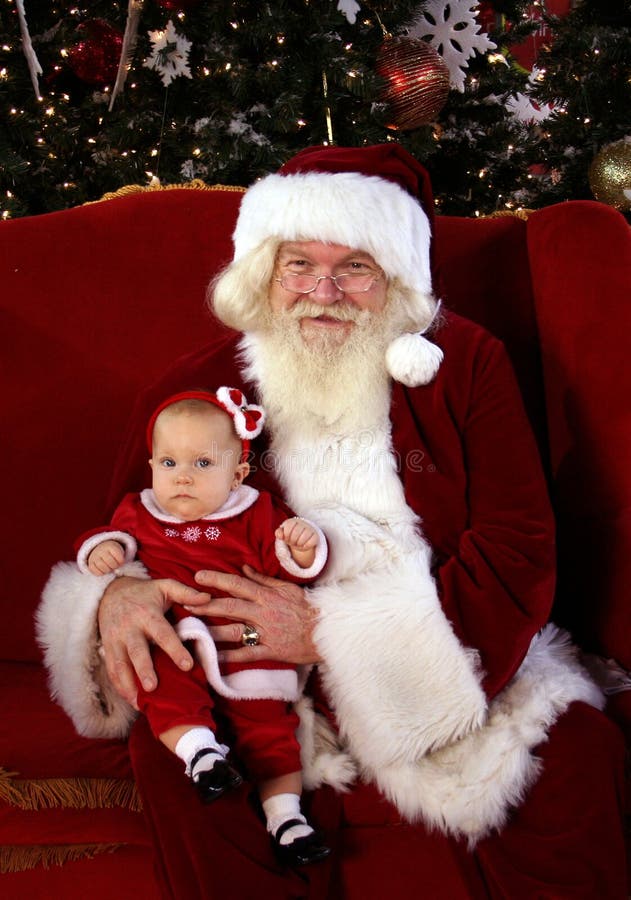 Worried baby and santa editorial stock image. Image of celebrity - 28289789