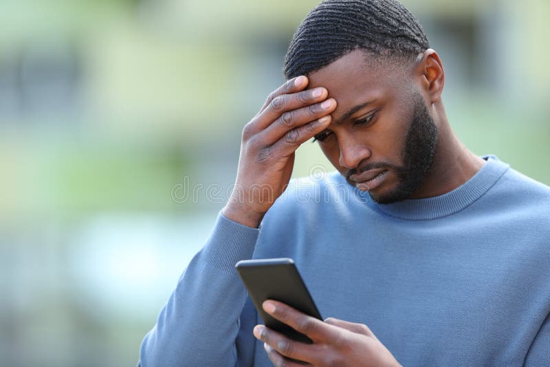Sad Black Man Complaining Checking Mobile Phone Stock Photos - Free ...