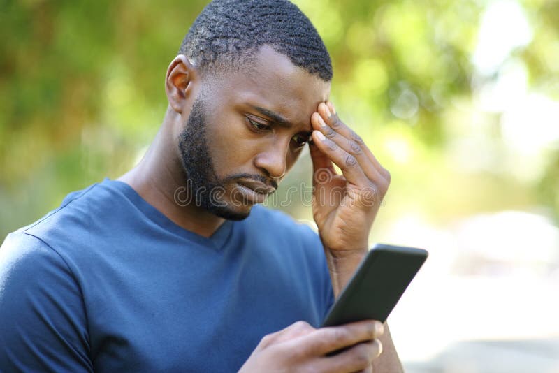 Sad Black Man Complaining Checking Mobile Phone Stock Photos - Free ...