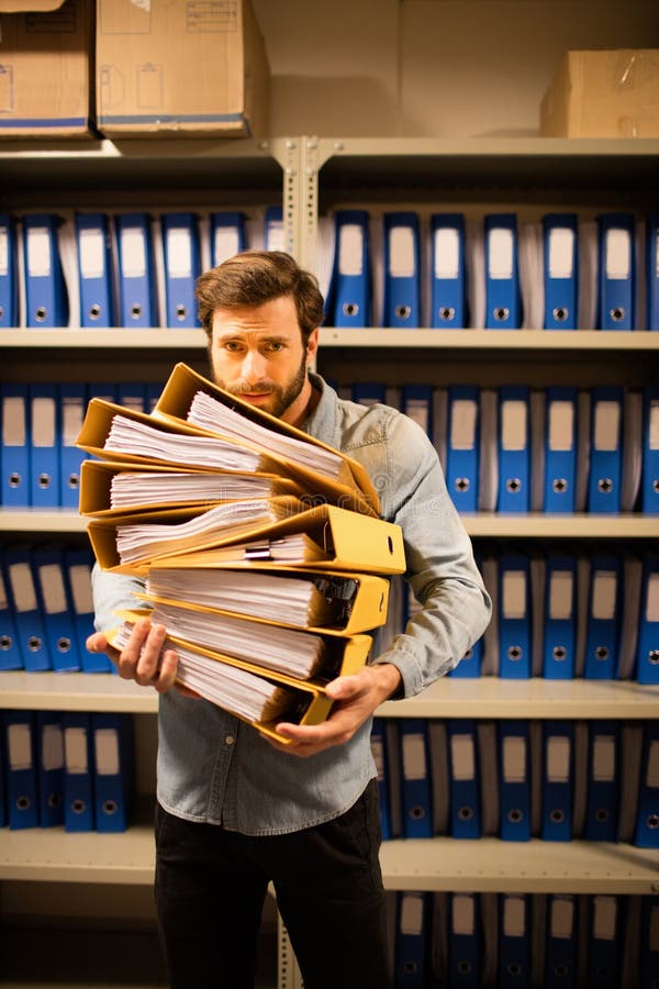 Documents Scattered by Fallen Businessman in File Storage Room Stock ...
