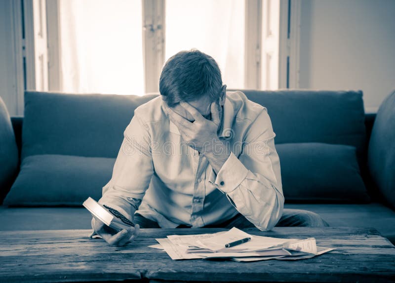 Upset Man In Stress Paying Bills Counting Finance With Calculator Bank