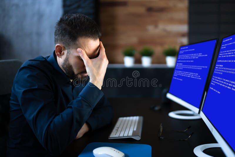 Worried Man at Computer with System Failure Screen Stock Image - Image ...