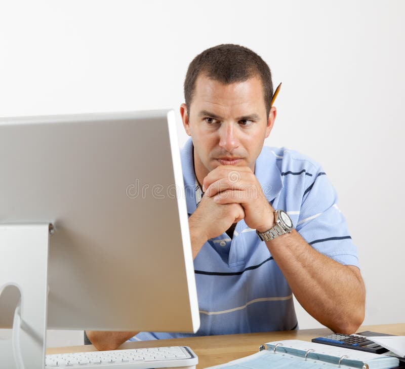 Worried Man at Desk and Computer Paying Bills Stock Image - Image of ...