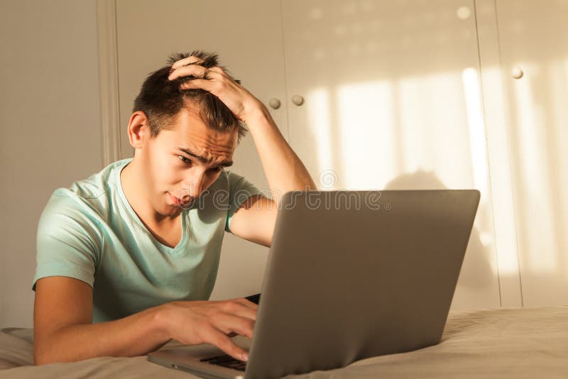 Worried Man in Front of the Laptop at Home. Stock Image - Image of ...