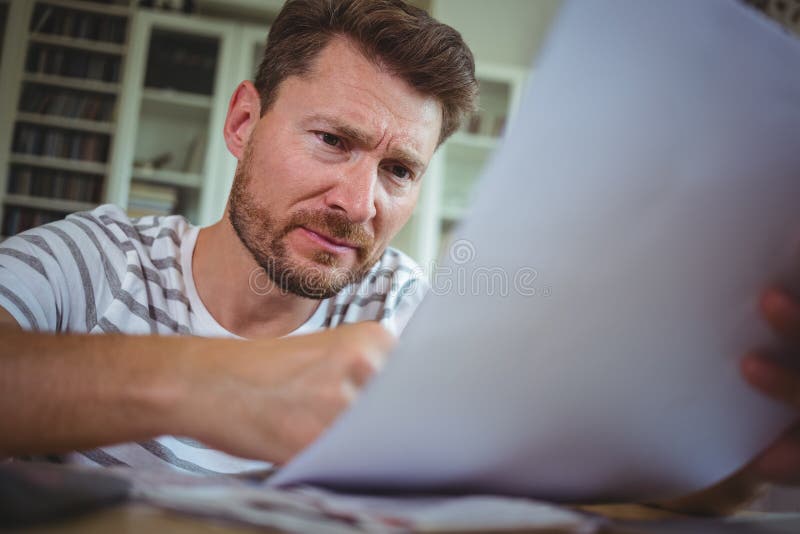 Worried Man Looking at His Bills Stock Image - Image of recession ...