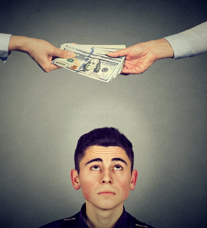 Worried Man Looking Up at Hands Exchanging Money Stock Photo - Image of ...