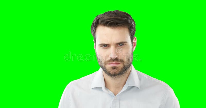 Worried Man Standing Against Green Screen Stock Video - Video of ...