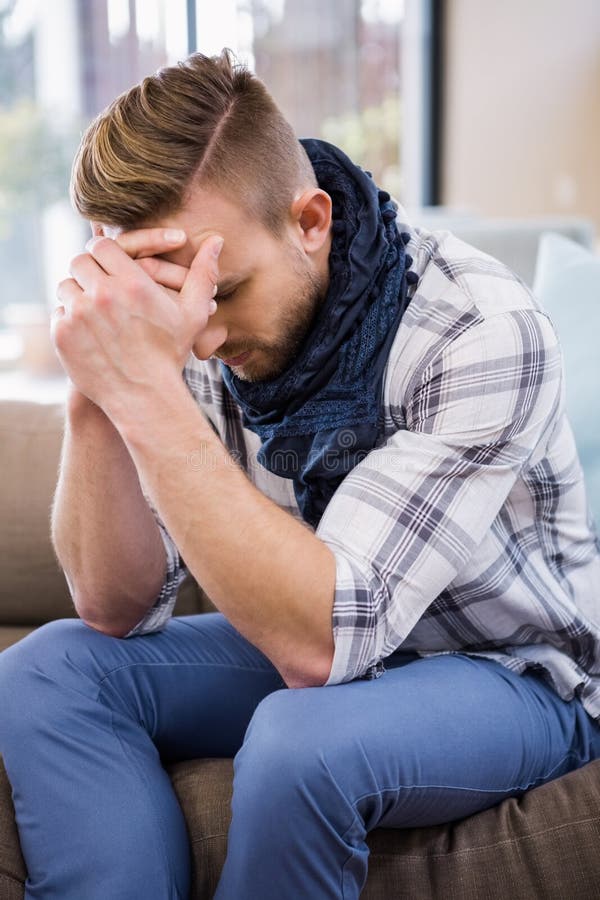 Worried Man Thinking on the Couch Stock Photo - Image of apartment ...