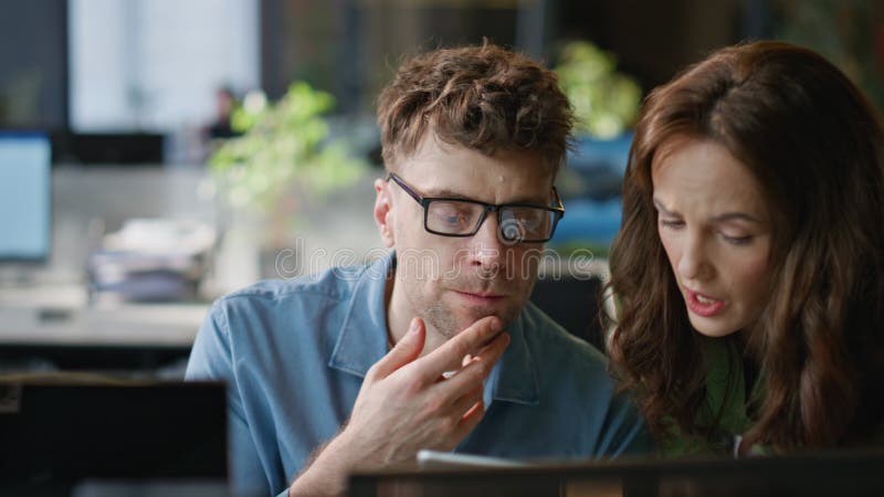 Worried Managers Analyzing Office Work Closeup. Serious Colleagues ...