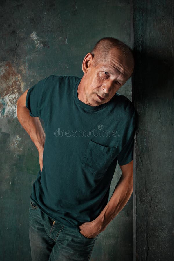 Worried Mature Man Standing at Studio Stock Photo - Image of human ...