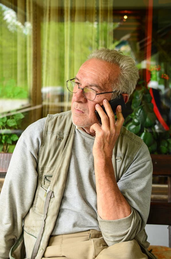 Senior man on the phone stock photo. Image of active, copyspace - 2464952