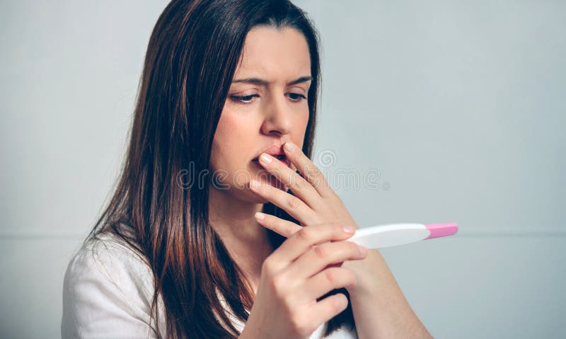 Pregnant Looking At A Pregnancy Test Stock Image Image Of Brunette