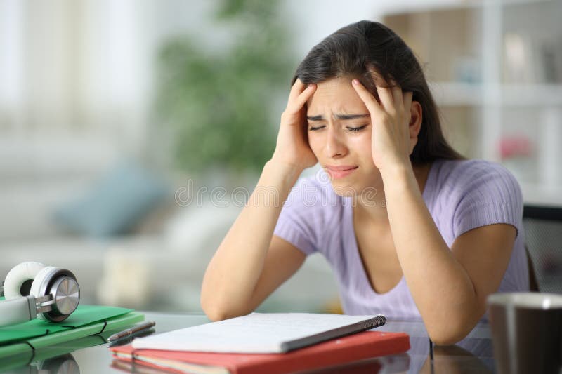 Worried Student Complaining Alone at Home Stock Photo - Image of ...