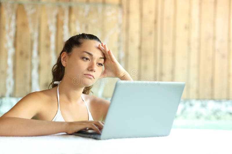 Worried Woman Using Laptop in Spa Stock Image - Image of life, bikini ...