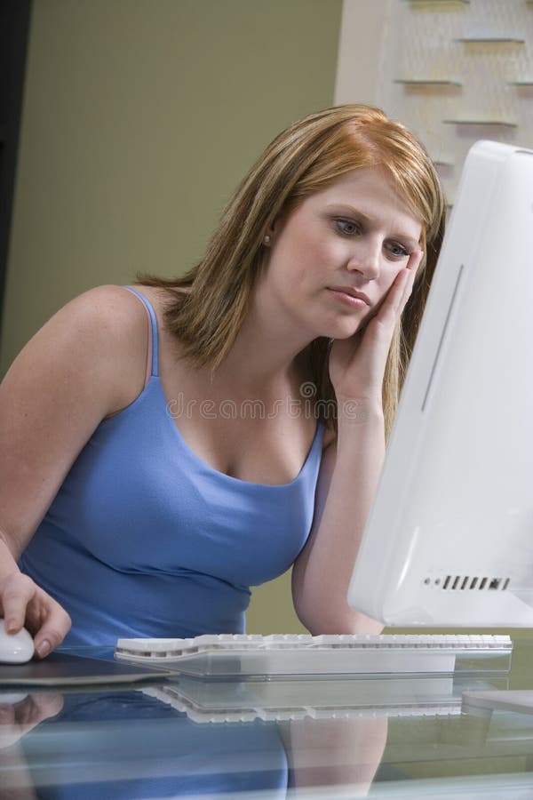 Worried Woman Using Computer Stock Photo - Image of exhausted, casual ...