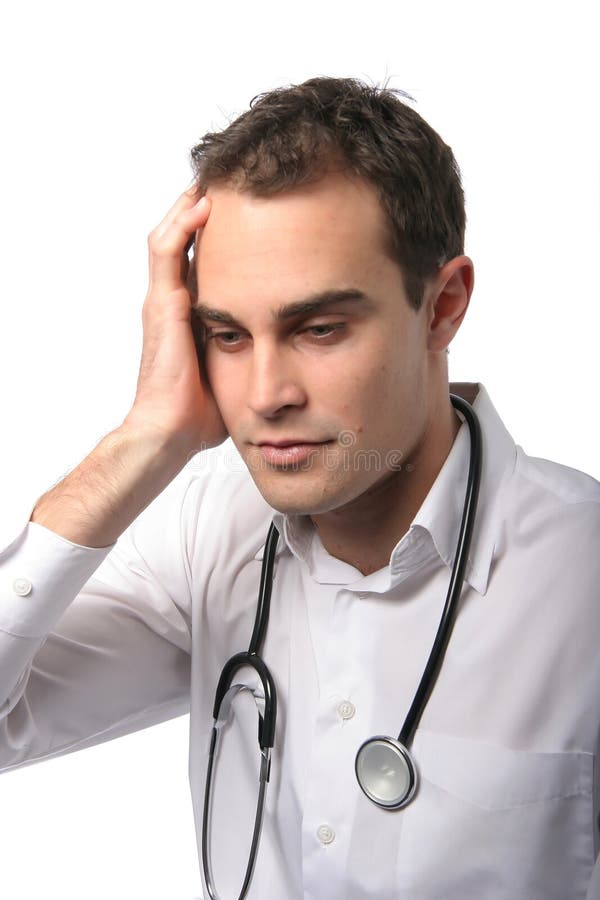Worried Young Doctor stock image. Image of handsome, clinic - 6033907