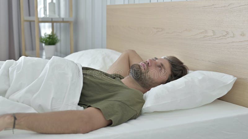 Worried Young Man Can`t Sleep and Looking Around Stock Photo - Image of ...