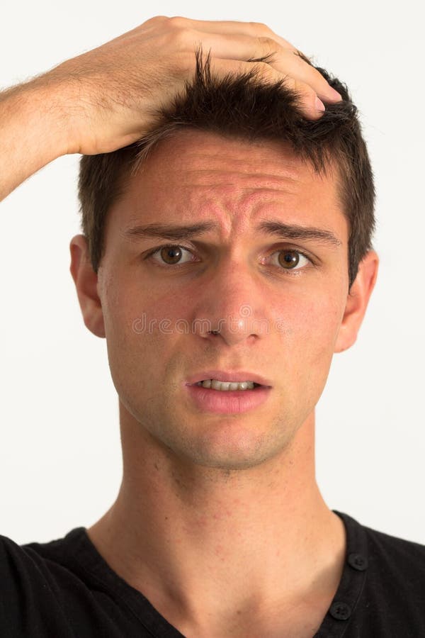 Worried Young Man with Hand on Face Stock Photo - Image of pain ...