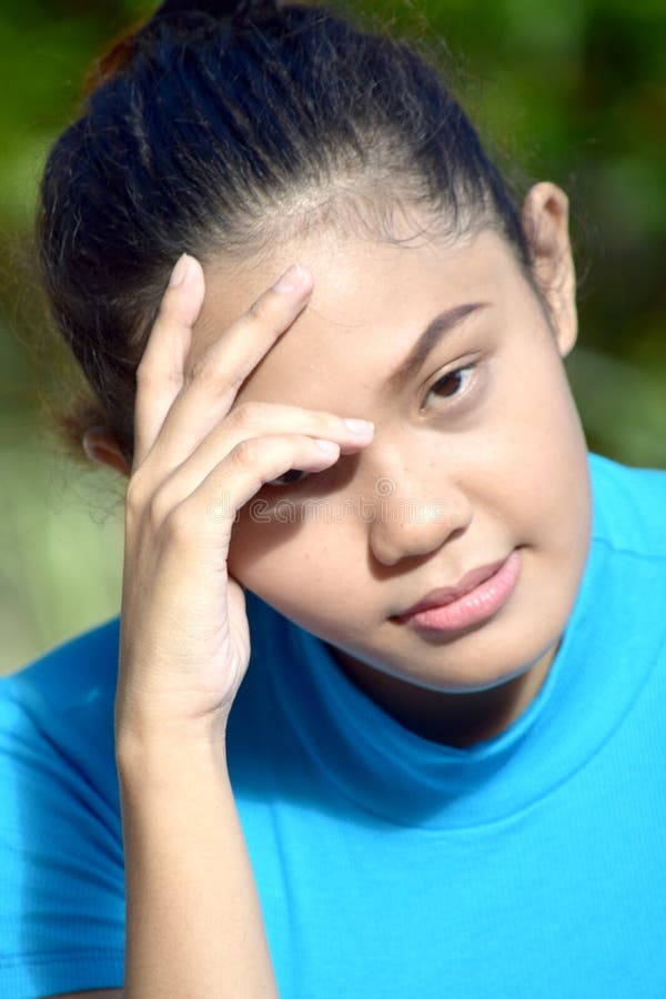 A Worrisome Asian Person stock photo. Image of worried - 139023758