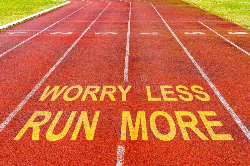 Worry less Run More Written on Rubberized Running Track Stock Image ...