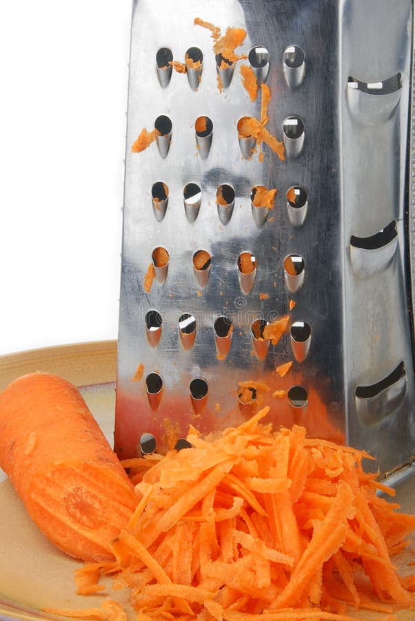 Wortelrasp stock foto. Image of sappig, metaal, pers - 45547910