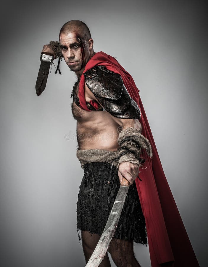 Wounded Gladiator with Sword Stock Photo - Image of male, bloody: 34645252