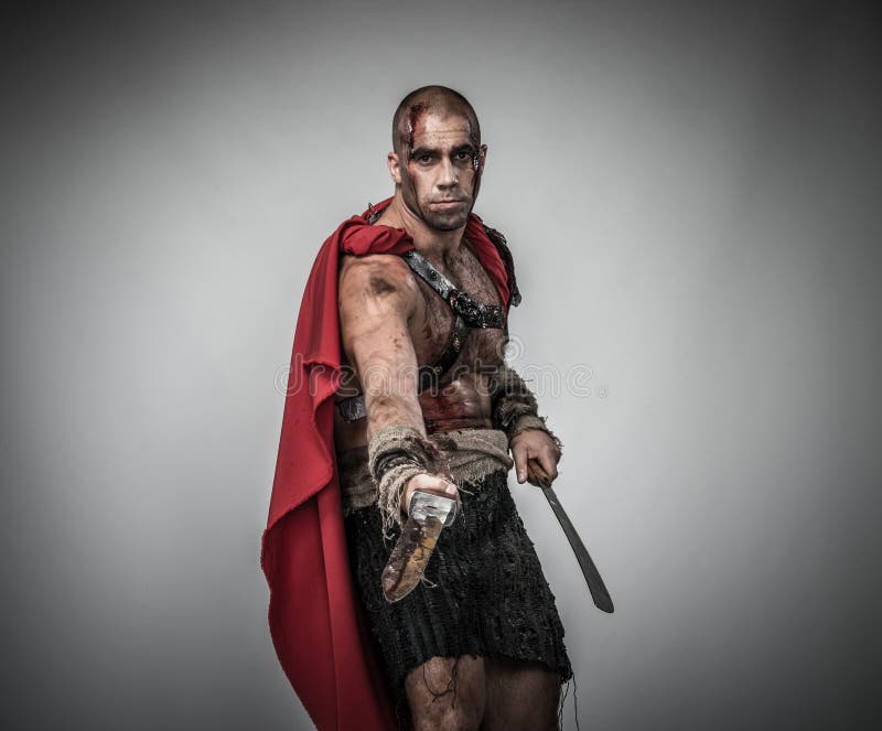 Wounded Gladiator with Sword Stock Image - Image of legionary, historic ...