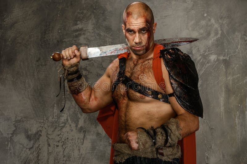 Wounded Gladiator with Sword Stock Image - Image of legionary, hero ...