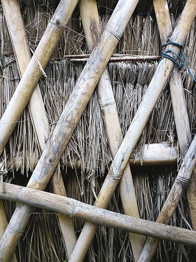 Woven Bamboo Grid Over Weathered Straw Thatch Abstract Vertical ...