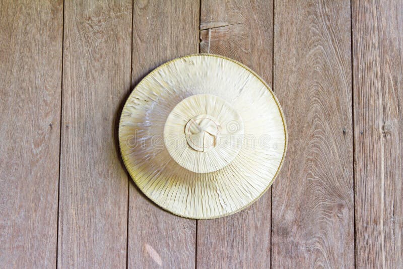 Woven Hat with a Leaf on Wood Stock Photo - Image of circular, round ...