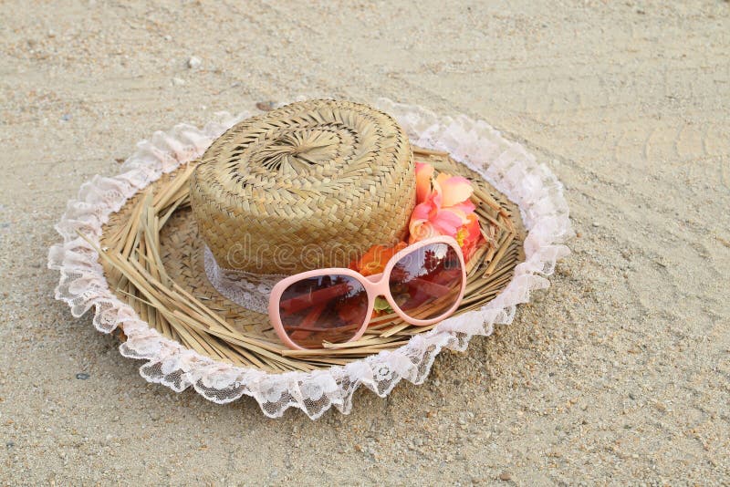 Woven hat and sunglasses stock image. Image of wear - 154461167