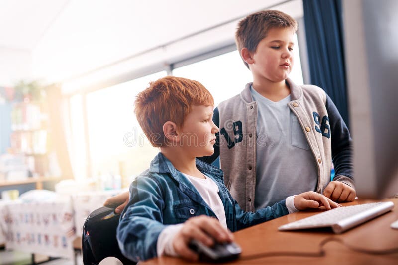 Wow is Actually Cool. Two Elementary School Children Browsing on a ...